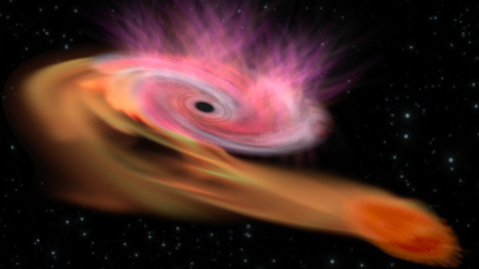 Astronomers discover black hole ripping star apart inside galaxy merger ...
