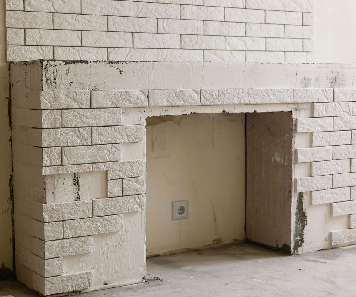 Your complete guide to blocking up a fireplace | Homebuilding